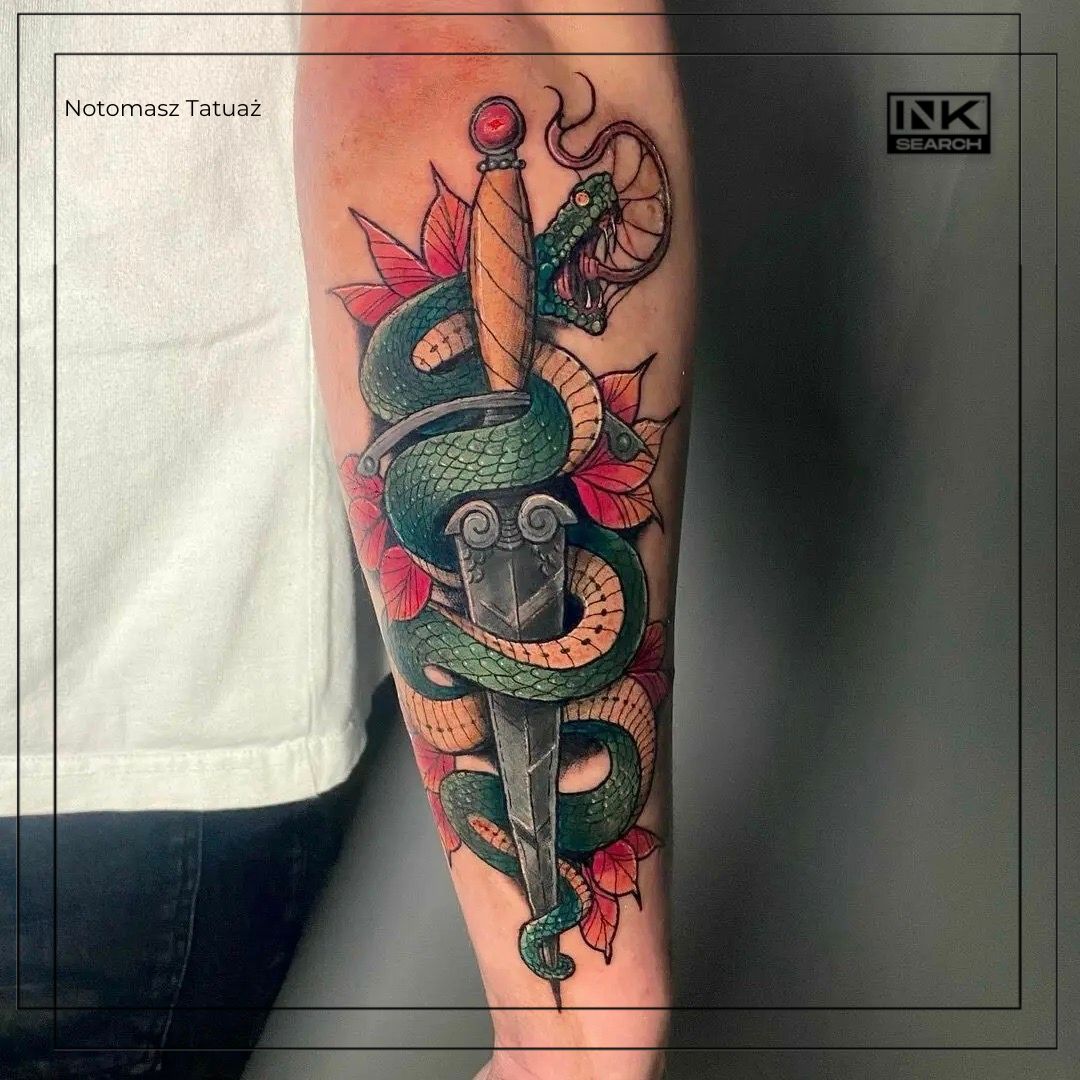 Snake Dagger Tattoos A Fresh Snake And Dagger Accompanied By A Healed